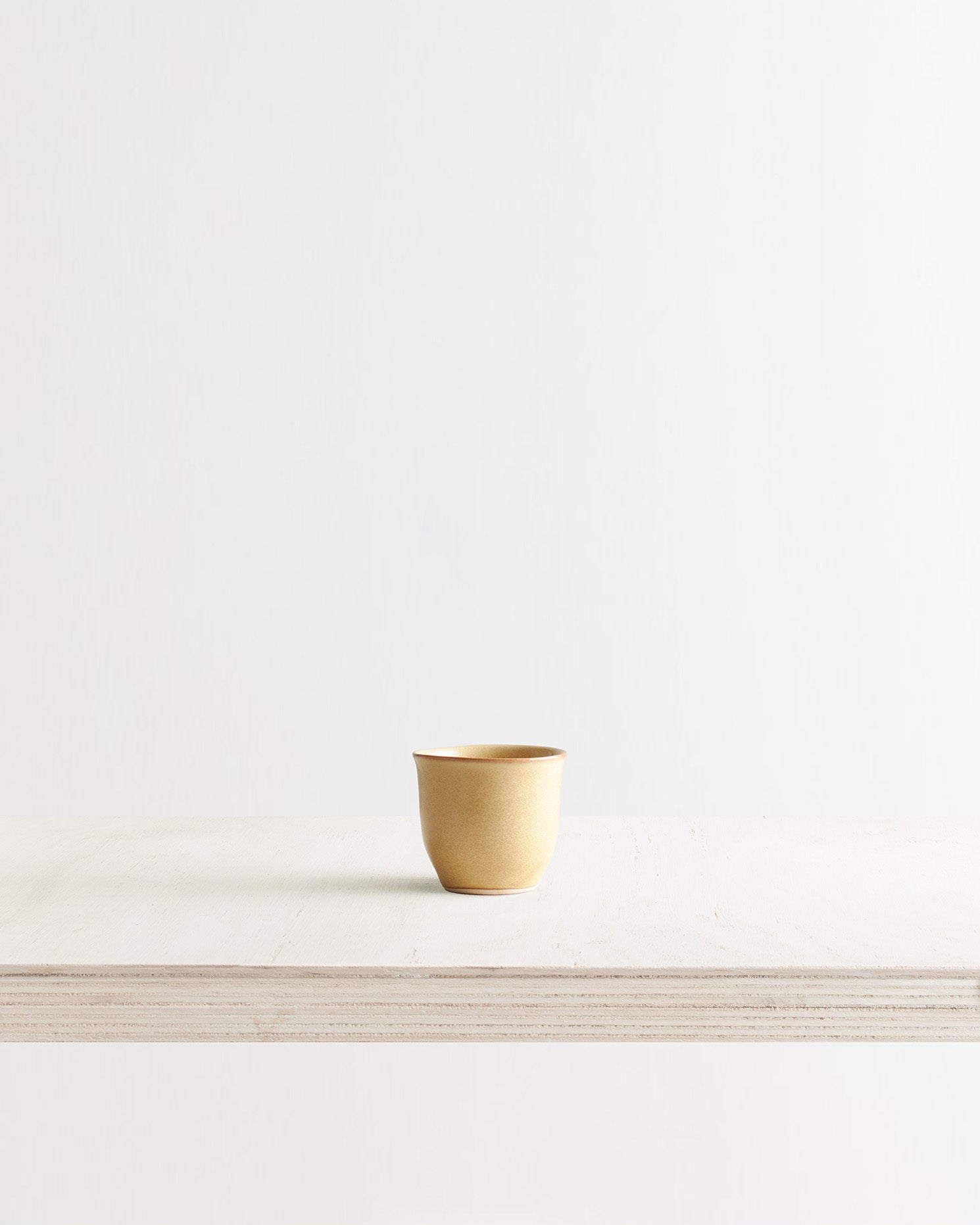 Handleless Stoneware Cup in Tan Glaze